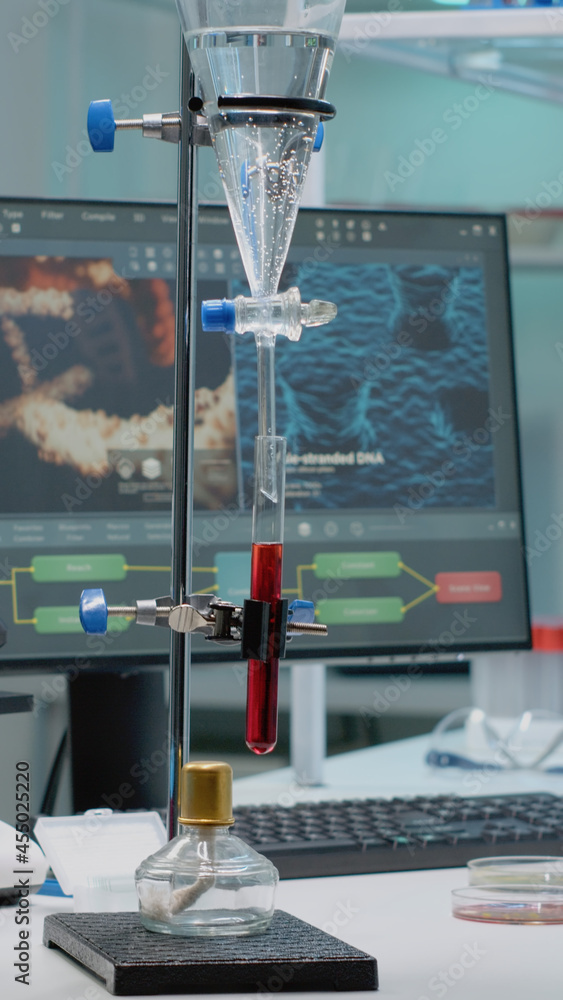 Chemical experiment with test tube in laboratory used for scientific ...