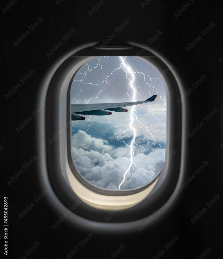 Plane is flying through the storm.Aircraft lightning. The plane was hit ...