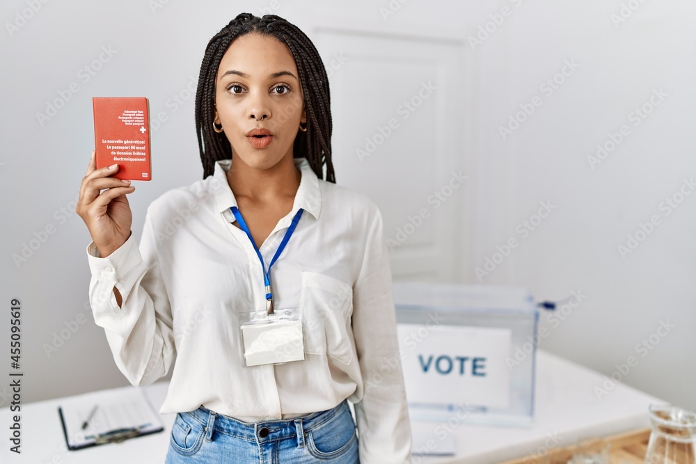 Young african american woman at political campaign election holding ...