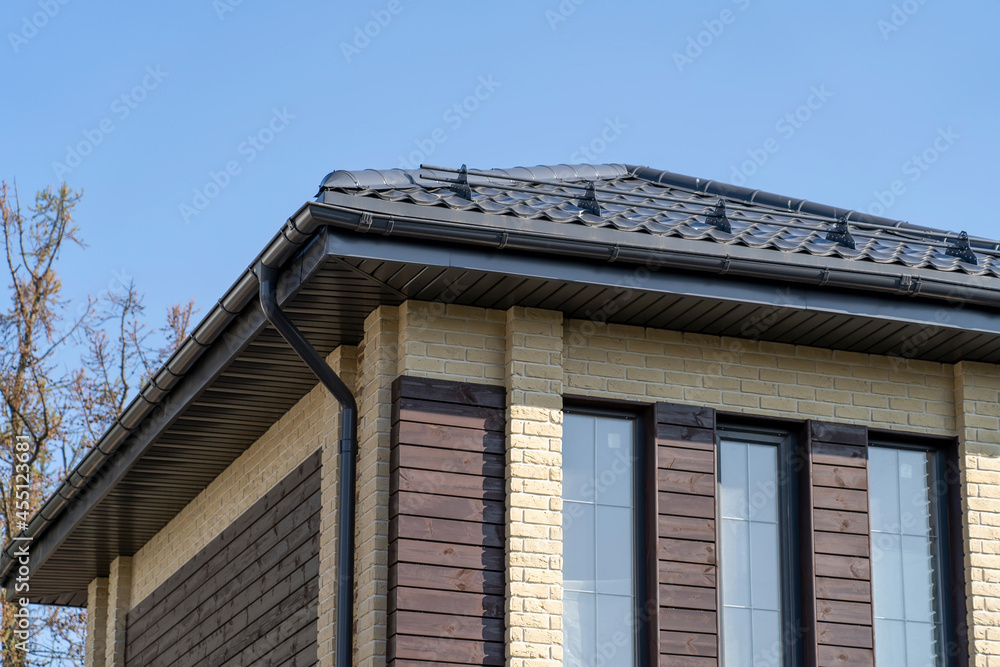 Tiled roof with segment of snow holding structure, Gutter system for ...