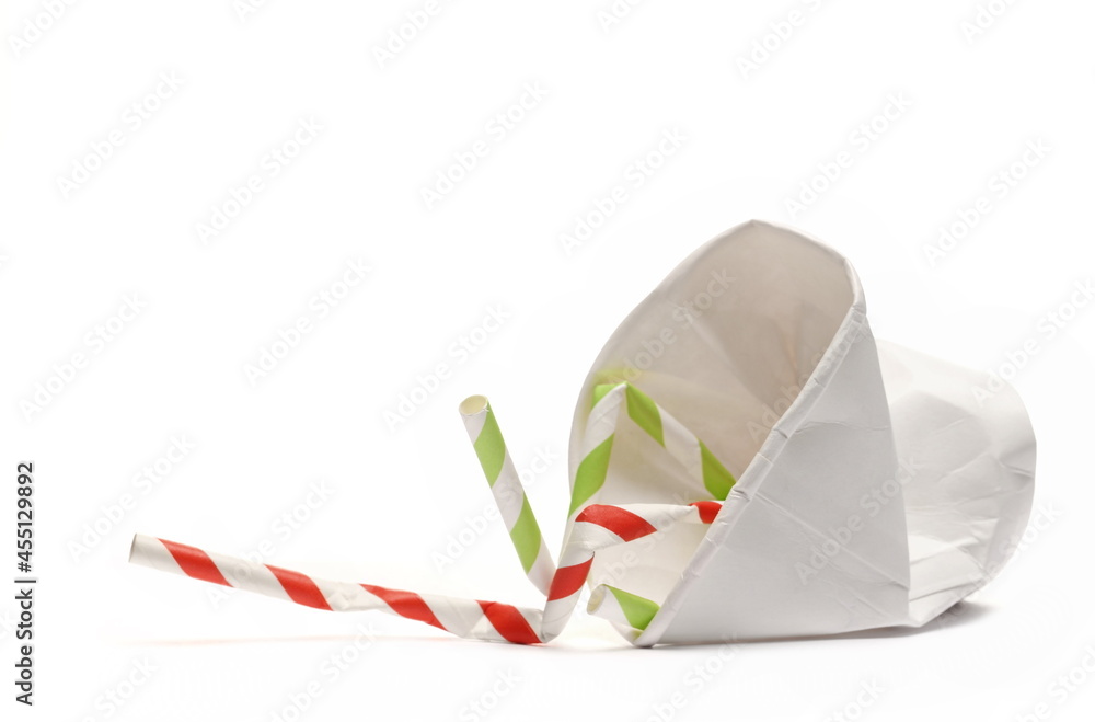 Disposable crumpled, paper cup and drinking straw for throwing away and ...