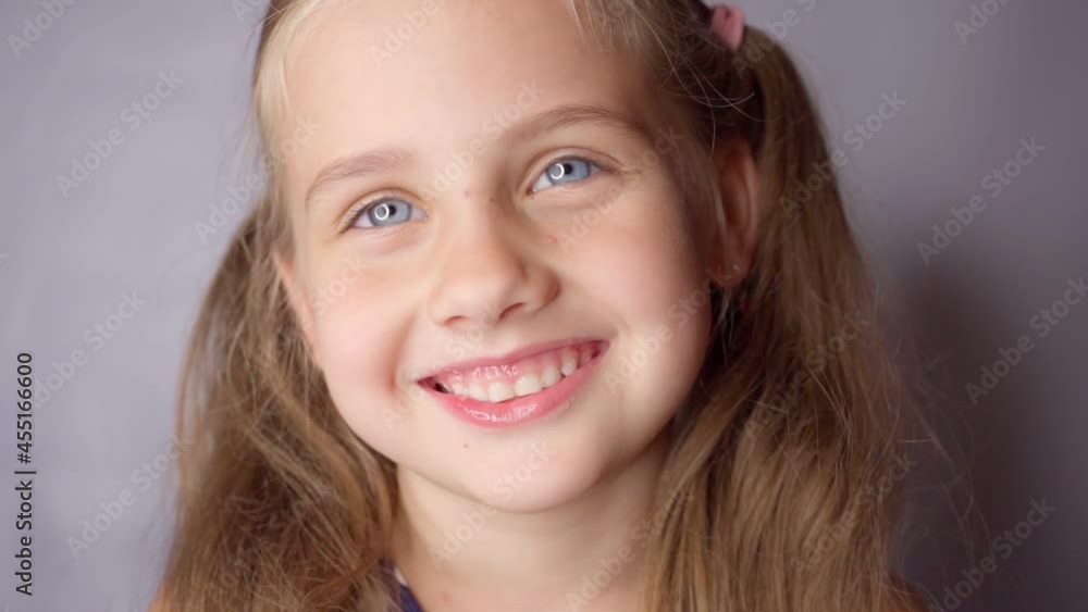 Portrait cute Little Girl Looking at Camera. Young Laughs Happily Child ...