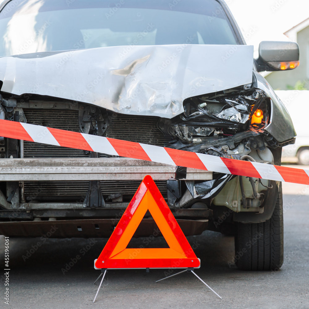 Red emergency stop triangle sign and Red warning police tape afore ...