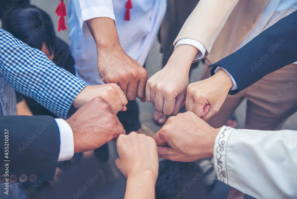 Diverse multiethnic Partners hands together teamwork group of multi ...