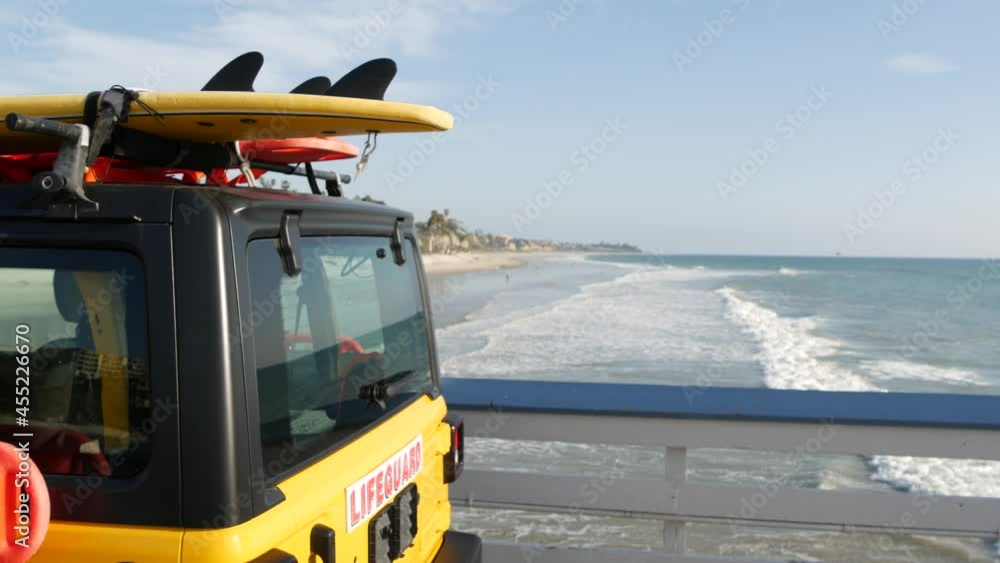Video Stock Yellow lifeguard car, San Clemente beach pier, California ...