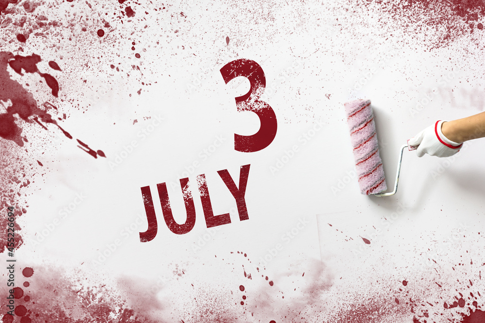 July 3rd. Day 3 of month, Calendar date. The hand holds a roller with ...
