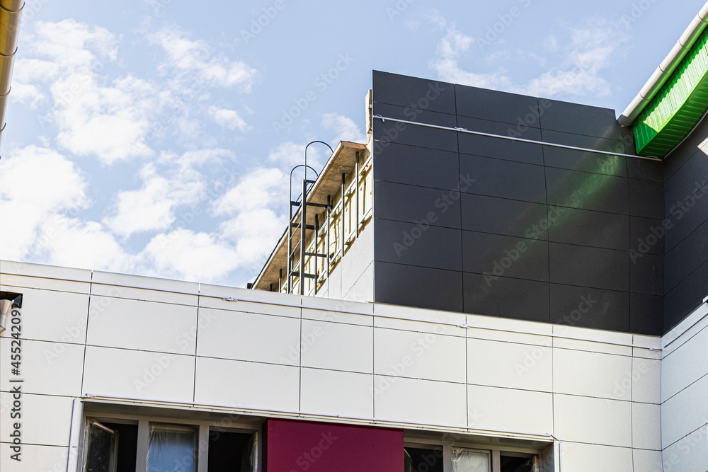 Ventilated facade to protect the shell of the house. Construction site ...
