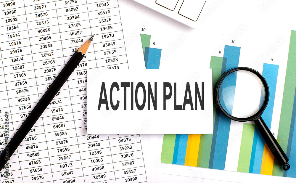 ACTION PLAN text on white card on the chart background Stock Photo ...