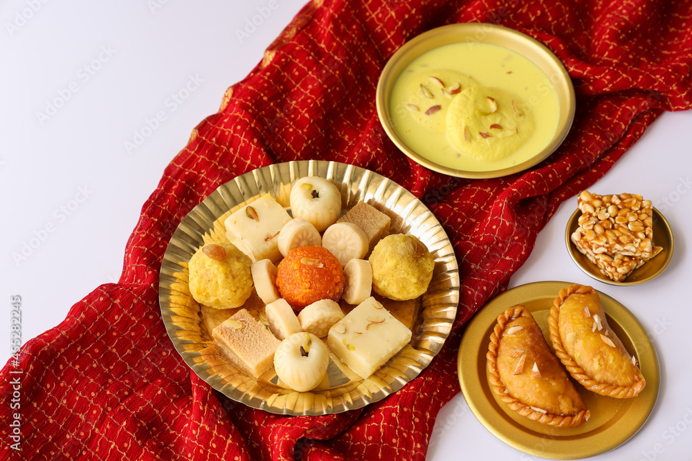 Diwali sweets Gujiya barfi Motichoor Laddu Rasmalai Indian sweet ...