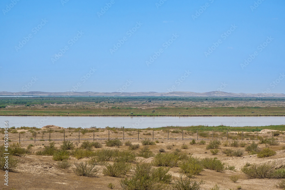 Border between Uzbekistan and Afghanistan. Countries are separated by ...