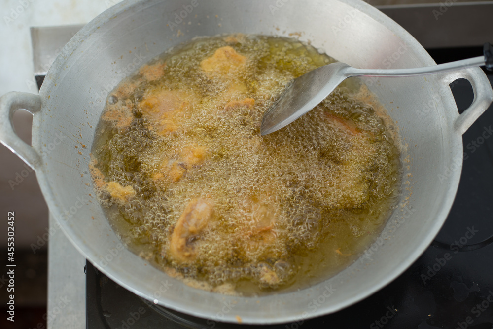 Unhealthy diet. Deep fried chicken of top view. Golden color fried ...