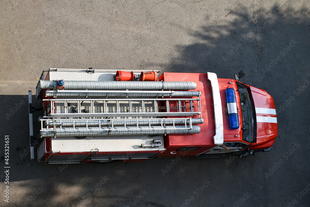 Fire truck, top view from the window of a house or building. View from ...
