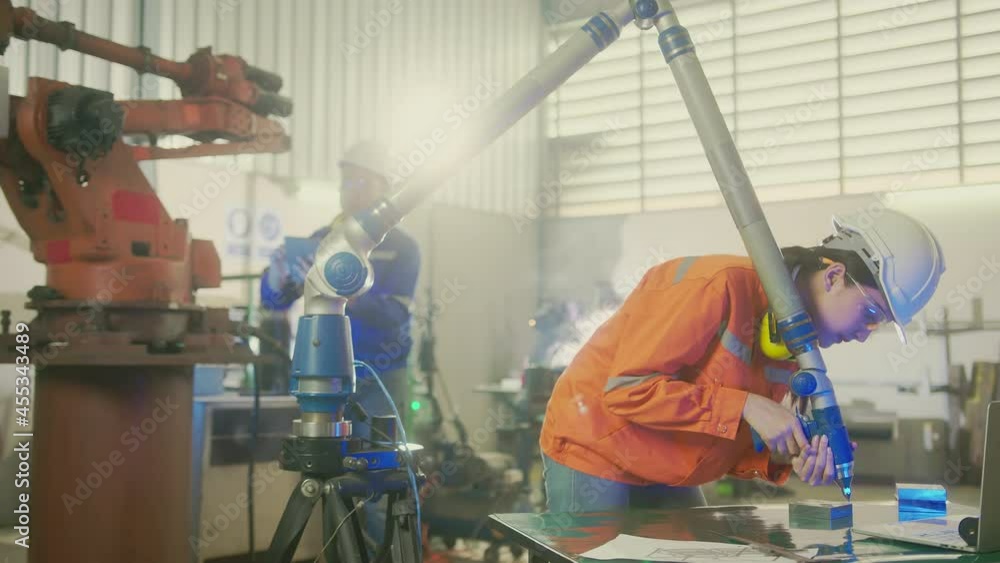 asian female engineer specialist with Measuring machine with a ...