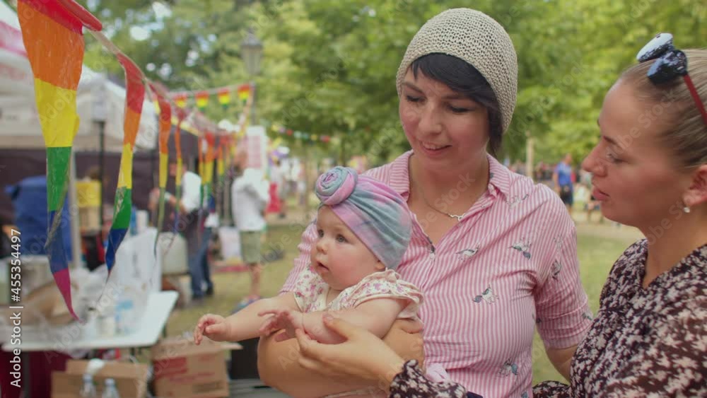 Video „Happy LGBT family with baby on Pride festival to commemorate the ...