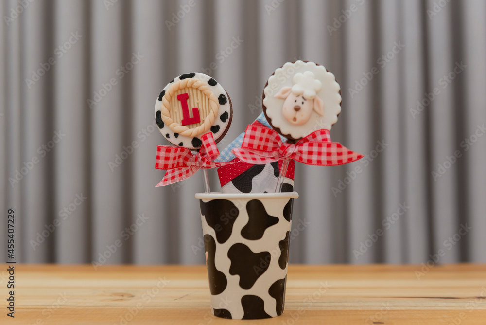 Chocolate lollipops decorated for children's birthday in country, farm ...