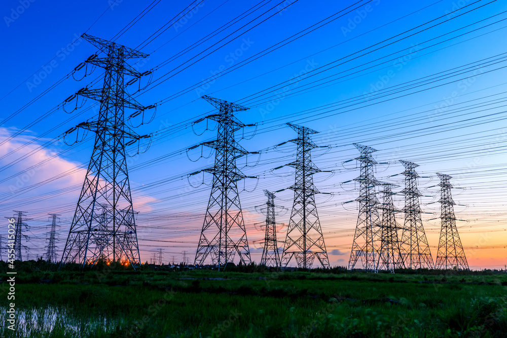 High voltage power tower industrial landscape at sunrise,urban power ...