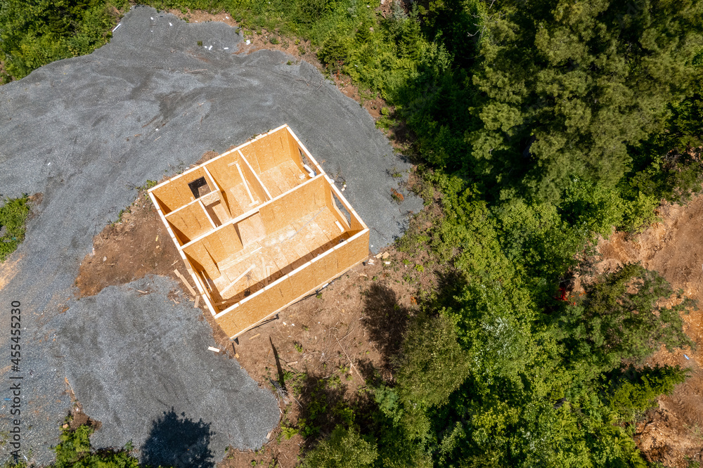 Aerial top view stages of construction houses wood build roof. New home ...