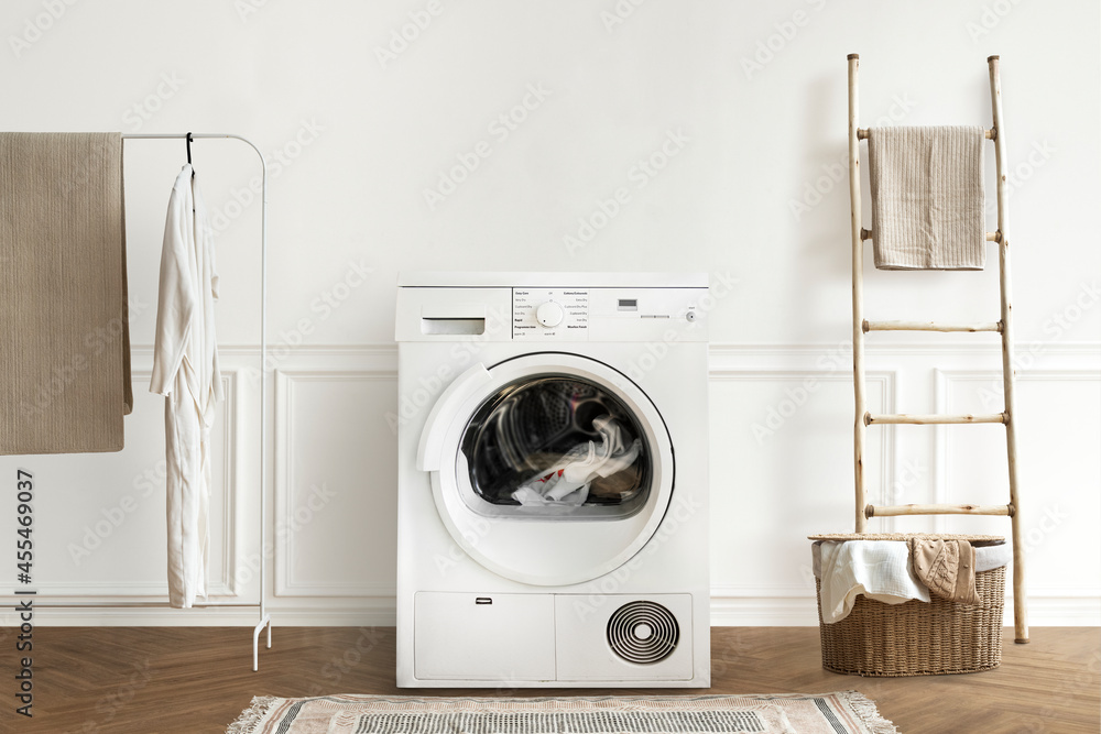 Washing machine in a minimal laundry room interior design Stock Photo ...