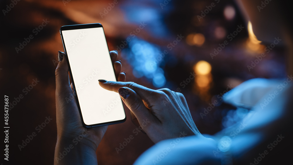 Beautiful Woman using Chroma Key Smartphone while Standing on the Night ...