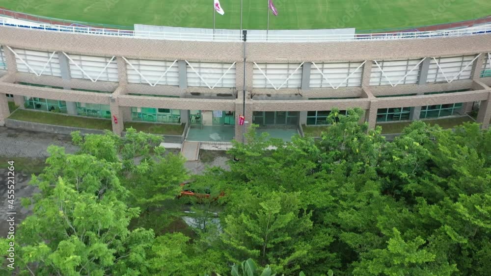 Cinematic aerial tilting up reveals the grand baseball stadium with ...