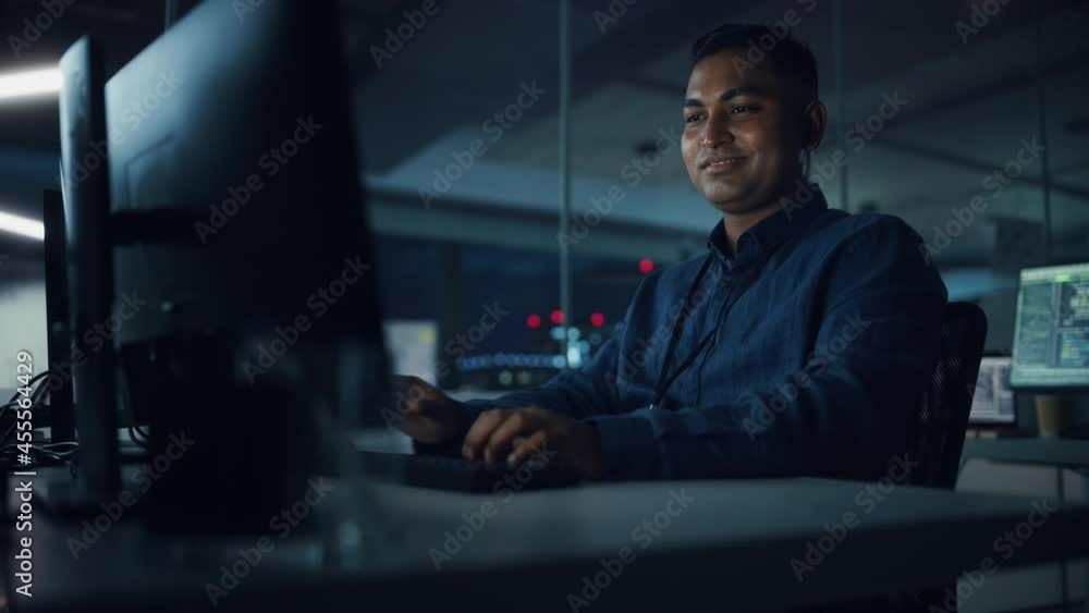 Night Office: Portrait of Handsome Indian Man in Working on Desktop ...