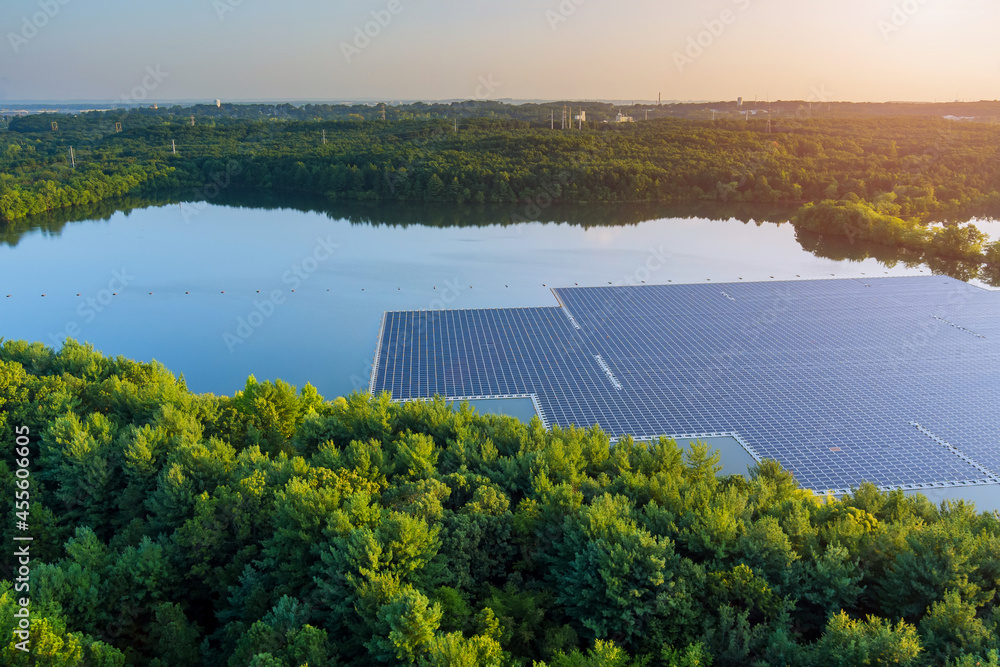 Aerial view of lake in renewable alternative electricity on floating ...