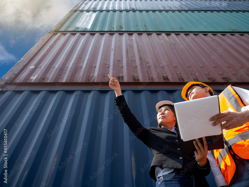 businesswoman and Shipper male talk work job career report tablet is ...