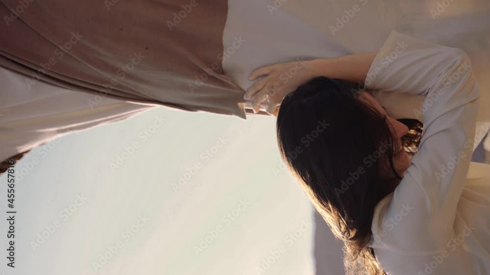 Mary mourns the death of Jesus at his feet. Jesus is crucified on the cross. Wind is blowing ...