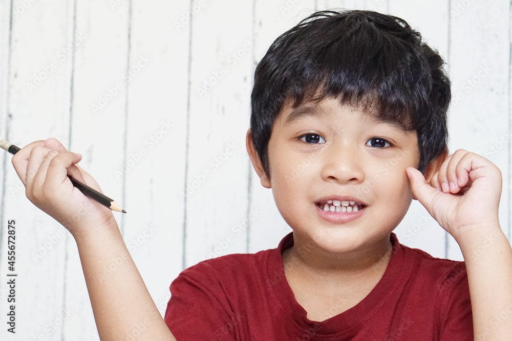 Cute Asian child little Thai boy 4 year old smile make a happy face ...