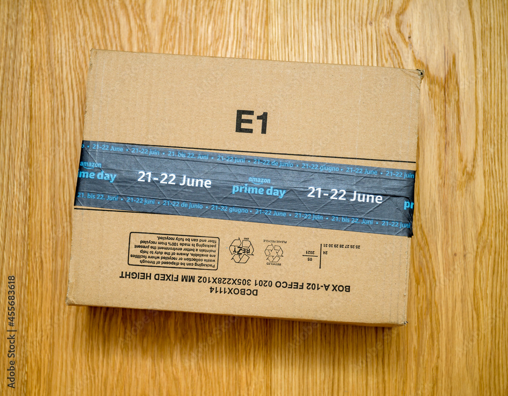 Paris, France - June 21, 2021: POV male hand holding Amazon parcel ...