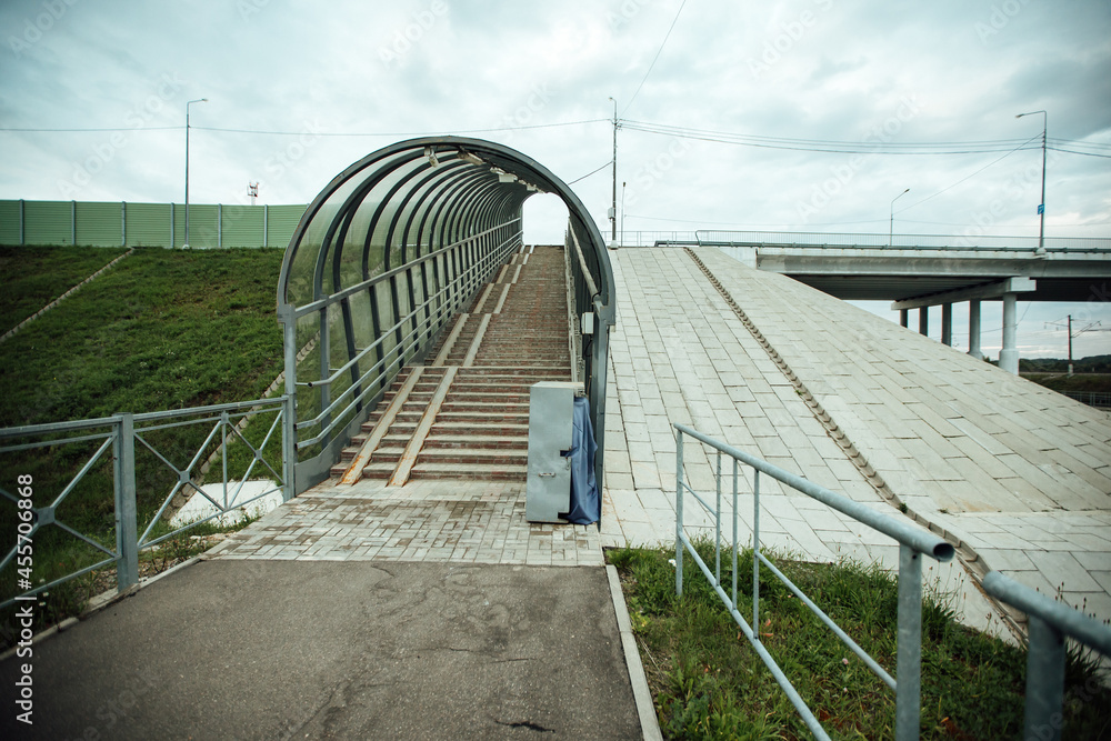 aboveground pedestrian crossing. stairs for people to cross over ...