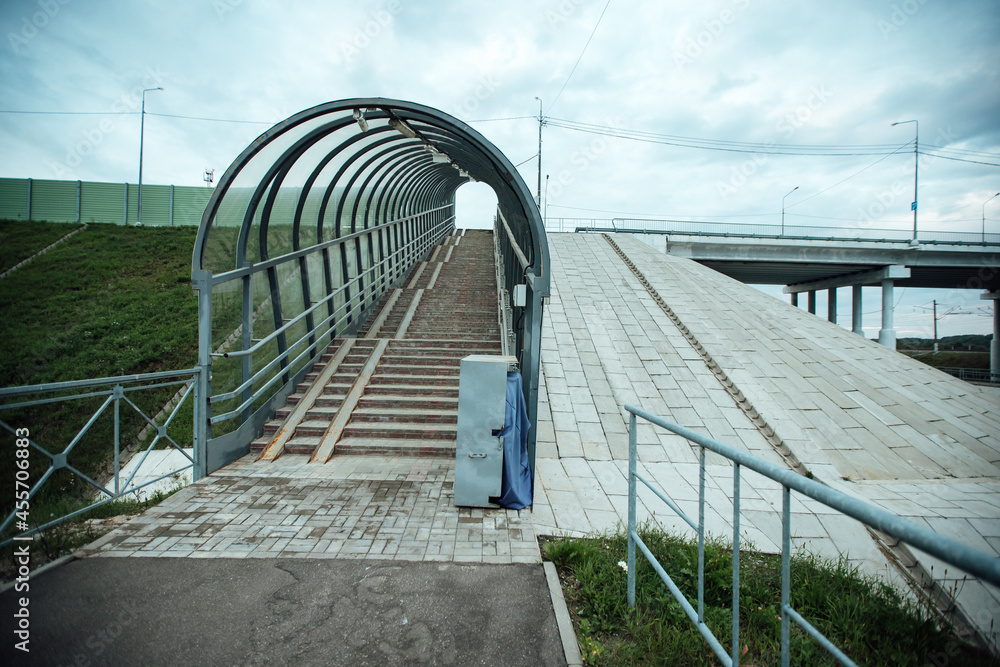 aboveground pedestrian crossing. stairs for people to cross over ...
