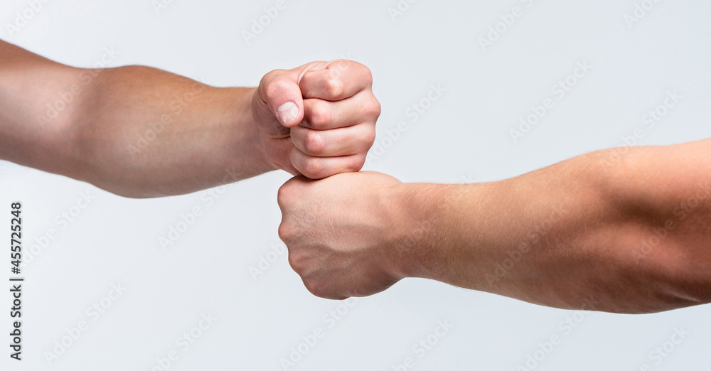 Team concept. People bumping their fists together, arms. Friendly ...