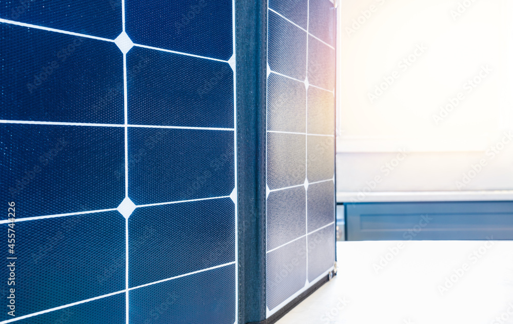 Solar cell panels reflect sunlight from window, supply collector system ...