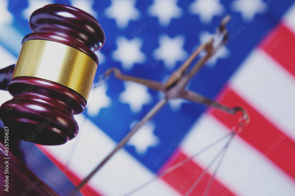 Judge gavel against United States national flag as symbol of judicial ...