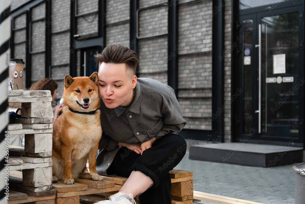 Gen z female and dog Stock Photo | Adobe Stock