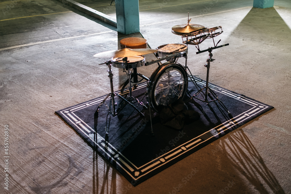 Drum kit set up in a parking garage Stock Photo | Adobe Stock