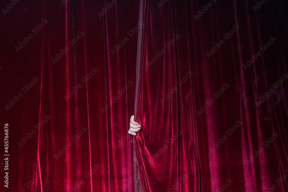 Hand Holding Red Curtain Stock Photo | Adobe Stock