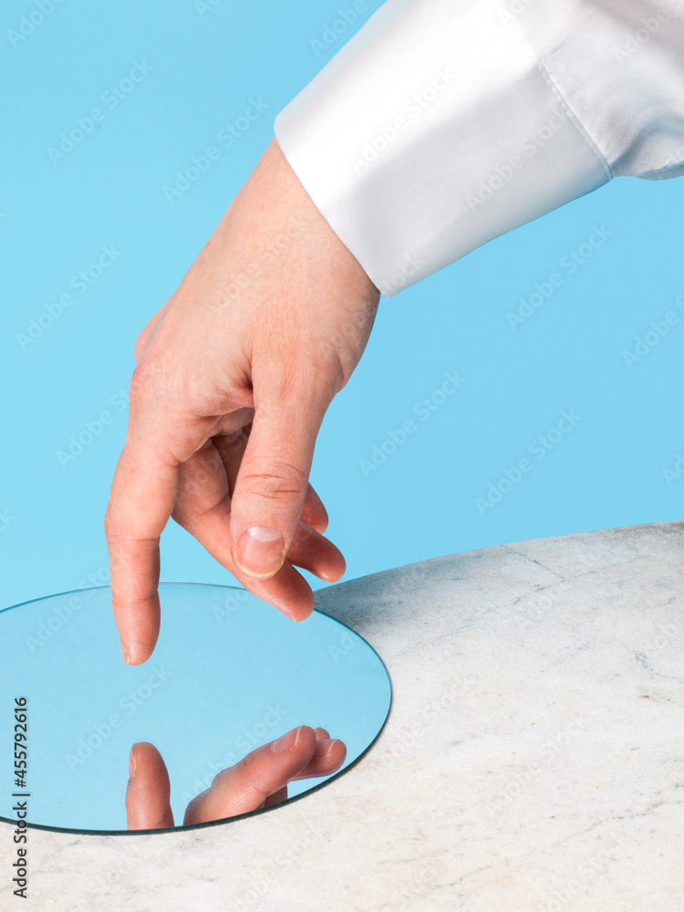 Finger pointing at its mirror reflection Stock Photo | Adobe Stock