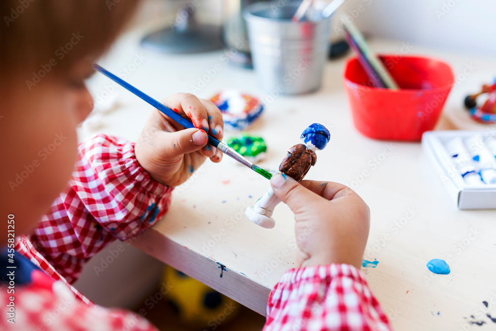 kid painting at home Stock Photo | Adobe Stock