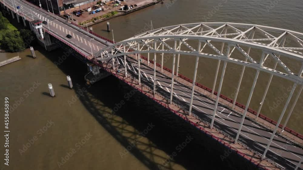 Drone Over Arch Bridge With Traffic In Noord River Near Hendrik ido ...