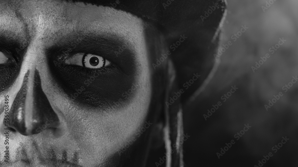 Close-up of scary man face in carnival skull Halloween makeup of ...