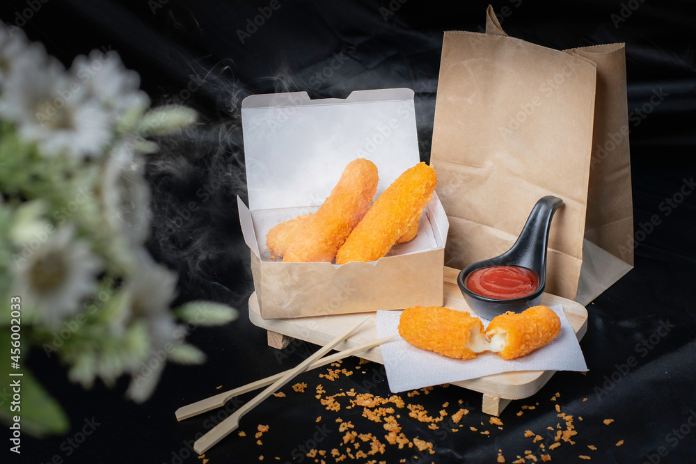 Nuggets, golden fried food, stuffed inside,stick, breaded, macro ...