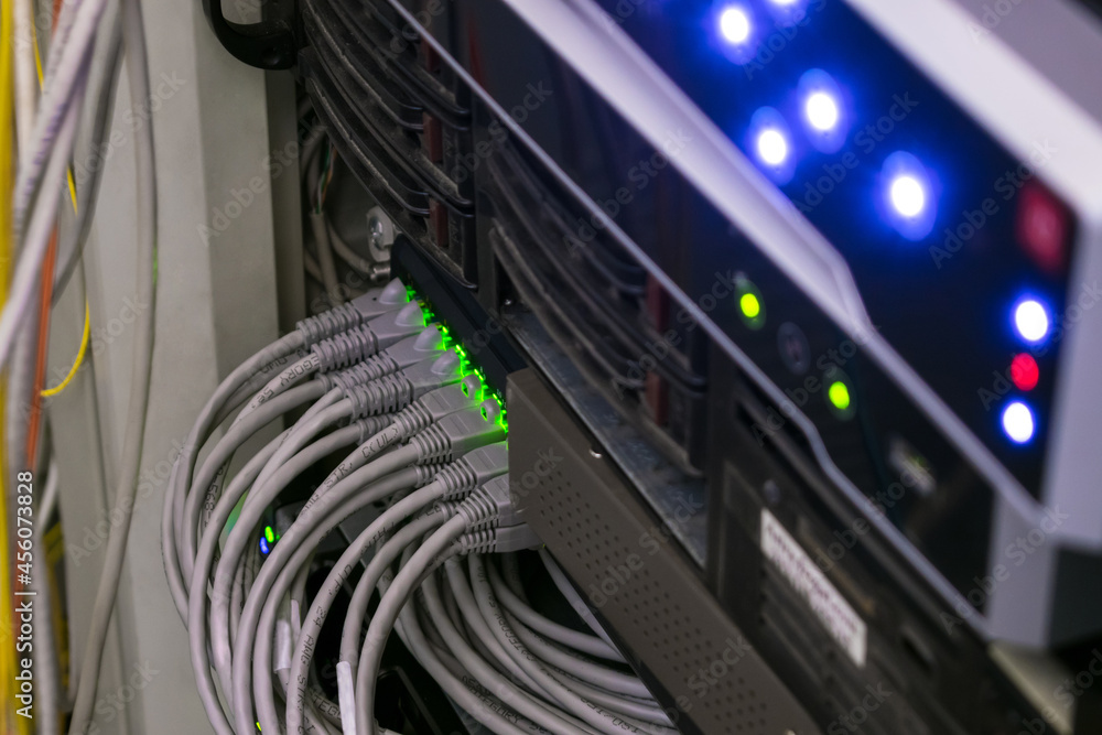 Many wires are connected to the interfaces of the server equipment ...