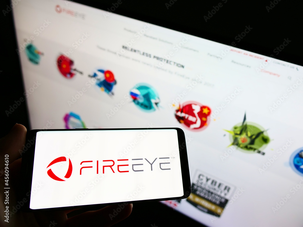 STUTTGART, GERMANY - Mar 09, 2021: Person holding cellphone with logo ...