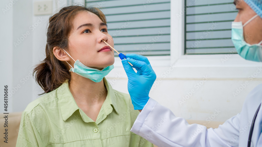 Doctor taking PCR test nasopharyngeal culture to woman patient. Nurse ...