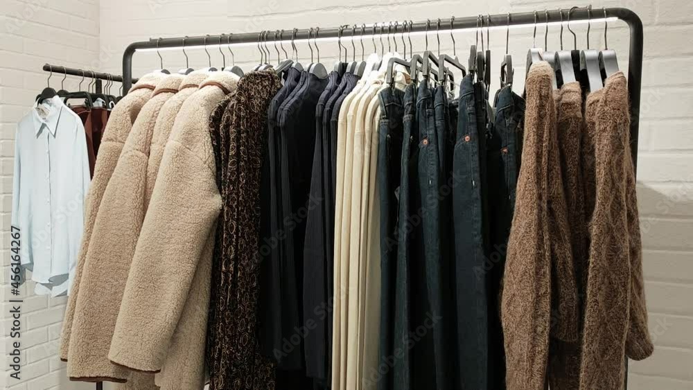 Top view of a rack with an autumn collection of women's clothing in a ...