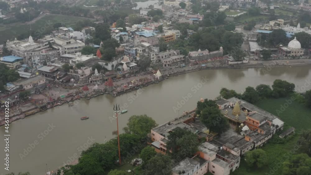 Drone shot of River Shipra with Mahakal Trishul in the foreground ...