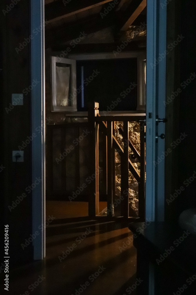 Dark second floor interior in traditional Mediterranean house. Opened ...