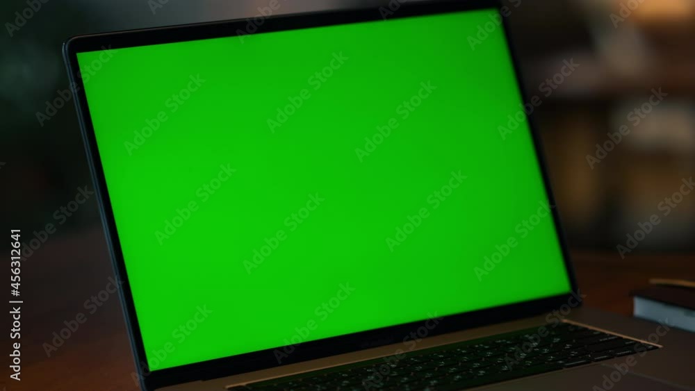 Green screen laptop computer closeup. Closeup mockup display computer ...